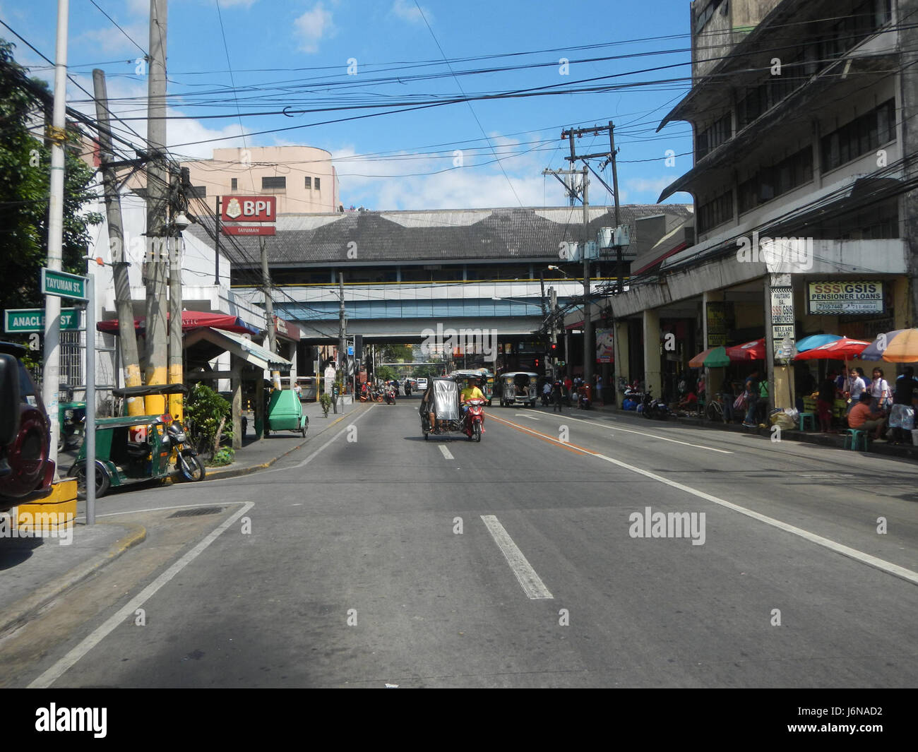 This image depicts Tayuman Street in the Santa Cruz district of Tondo, Manila, Philippines. It ...