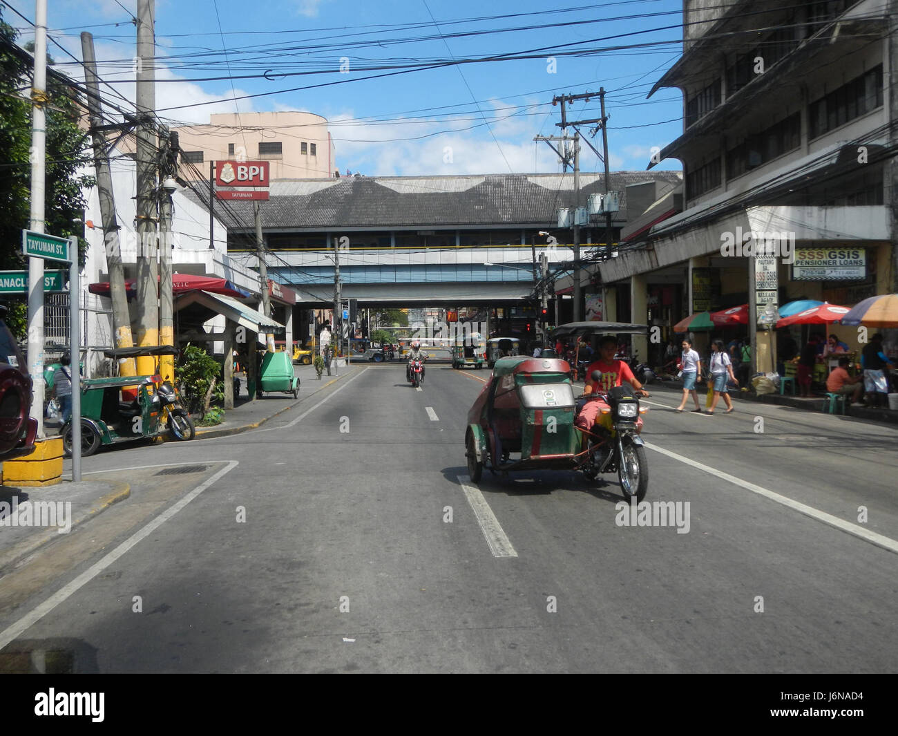 Tayuman Street in the Santa Cruz district of Tondo, Manila, is a ...