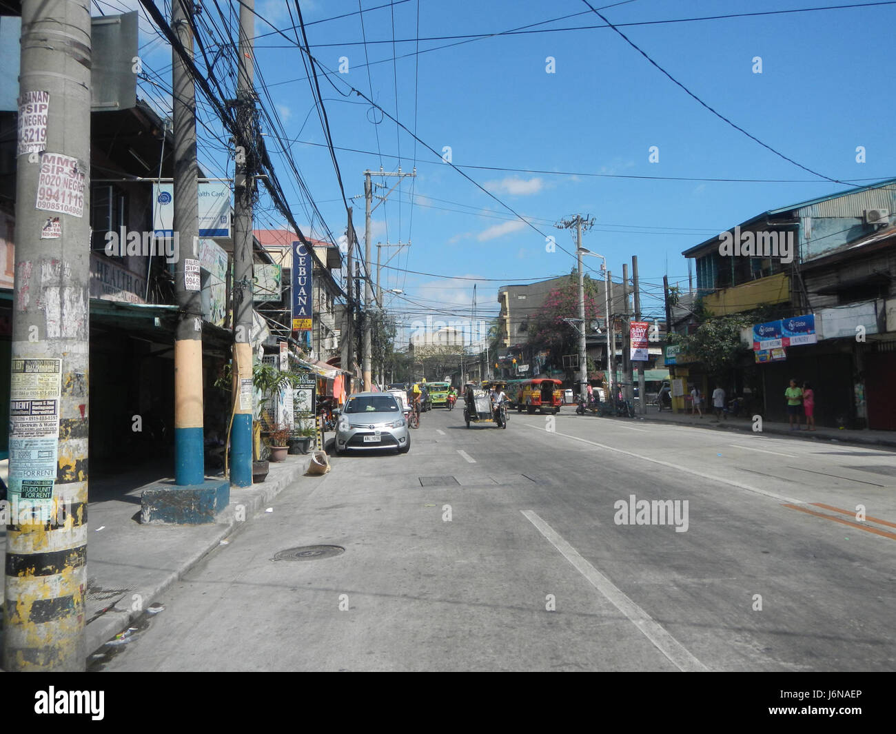 This photograph captures Tayuman Street in Santa Cruz, Tondo, Manila ...