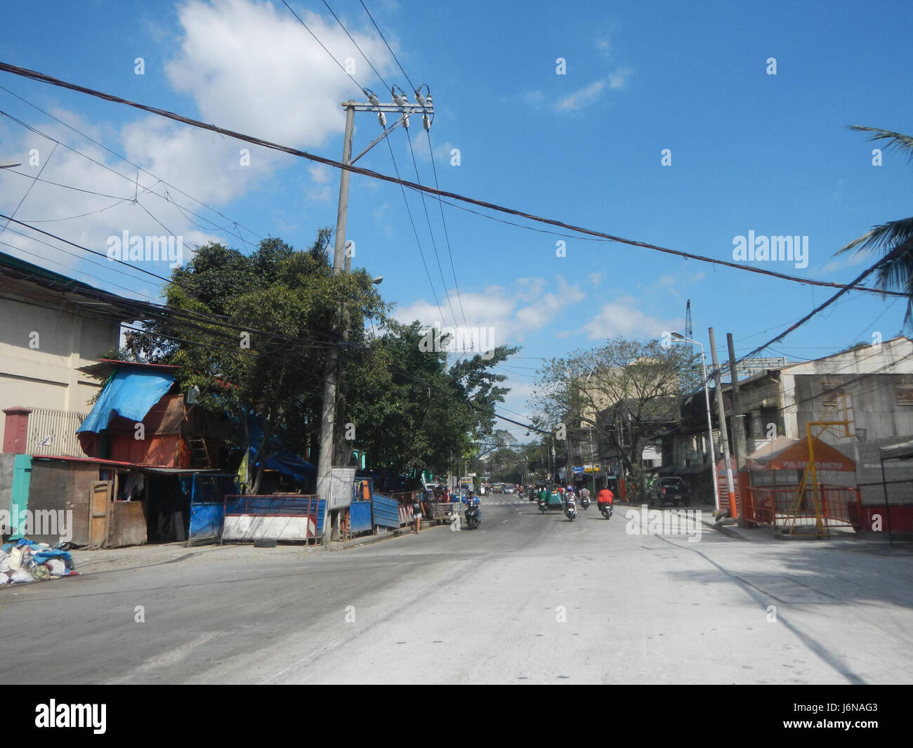 This image showcases Tayuman Street in the Santa Cruz area of Manila ...