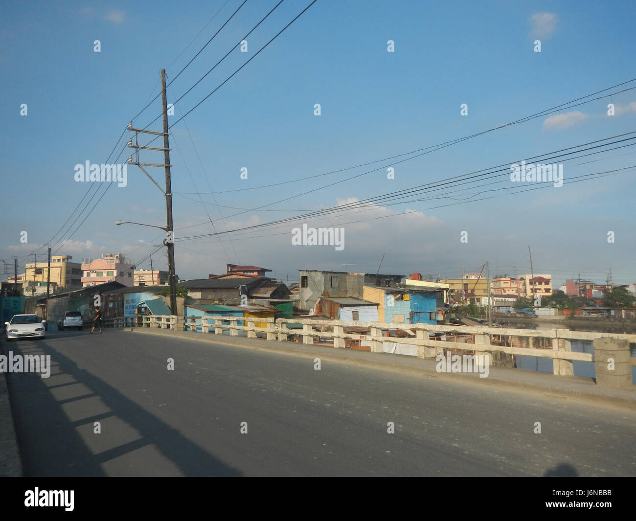 This photo depicts the Velasquez Bridge in Tondo, Manila, a key ...