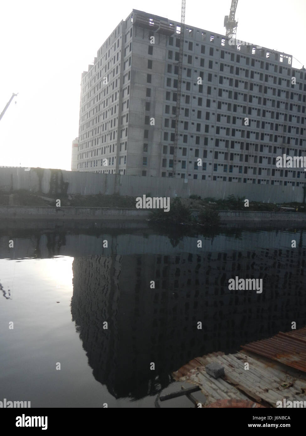 The image shows the Velasquez Bridge in Tondo, Manila, connecting ...