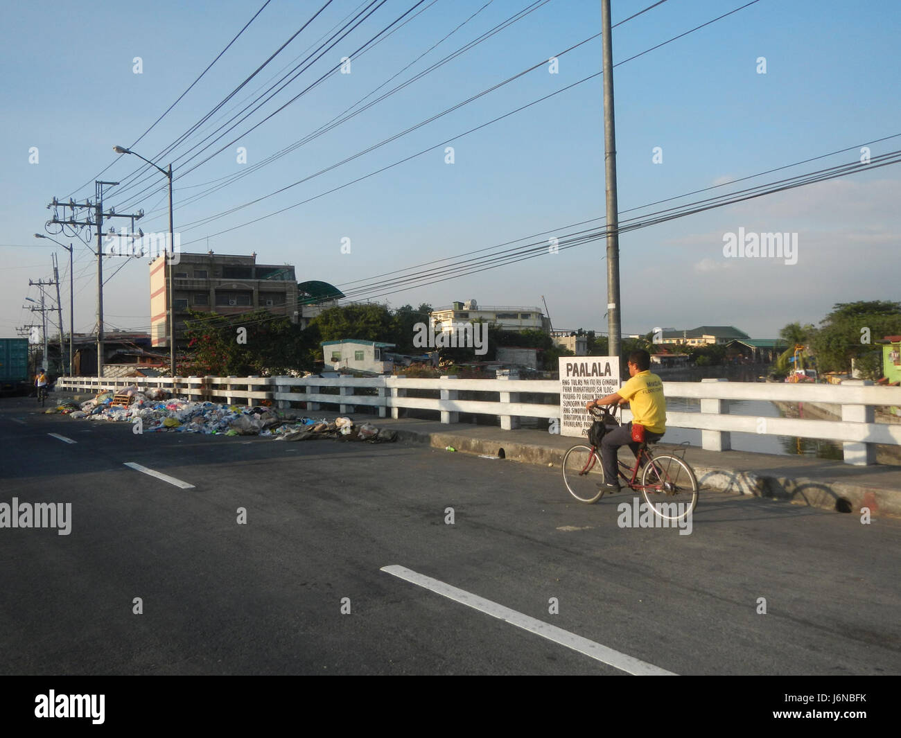 This image shows the Honorio Lopez Bridge in Tondo, Manila, with its ...