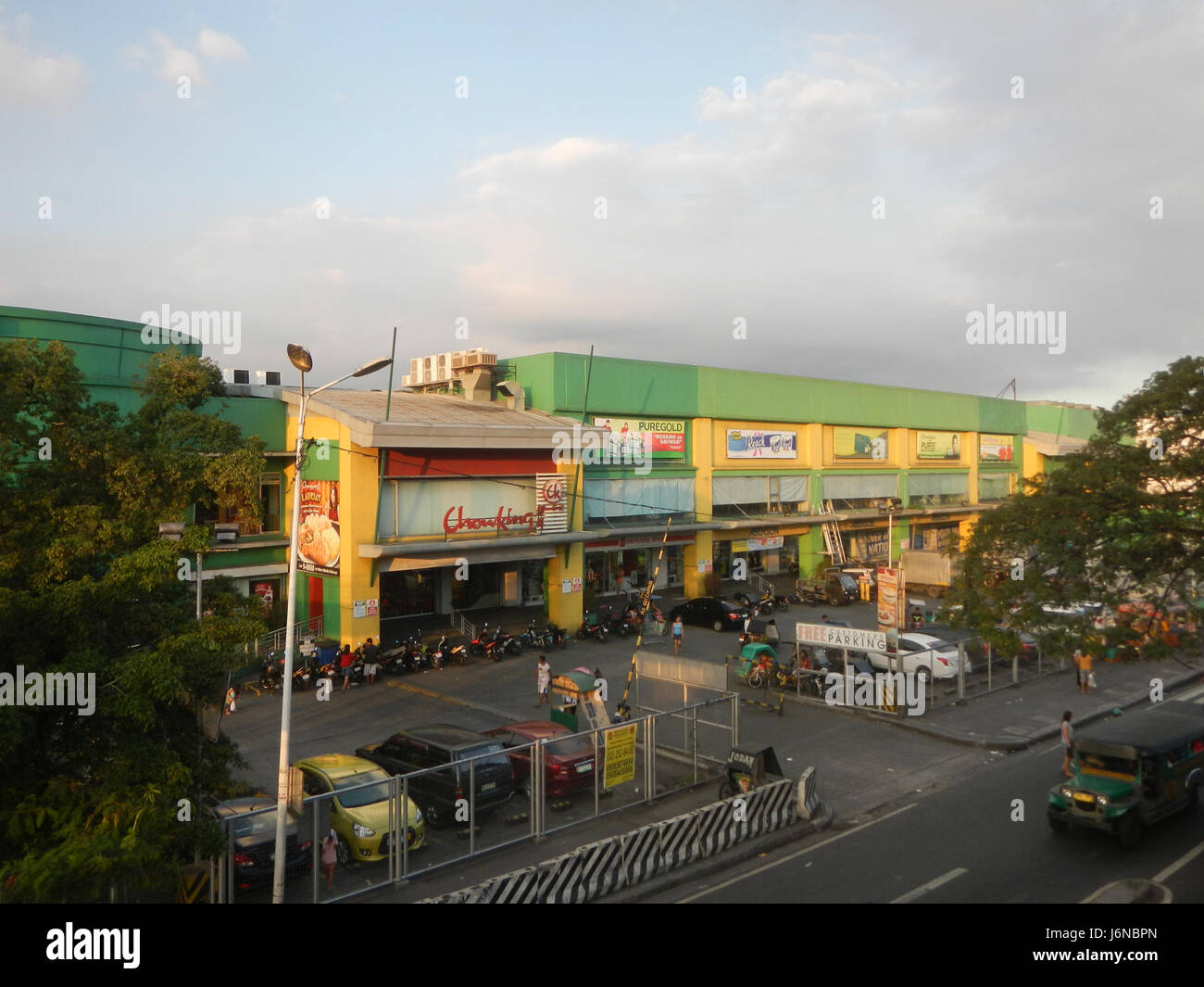 This image captures the pedestrian footbridge at the Puregold Tayuman ...