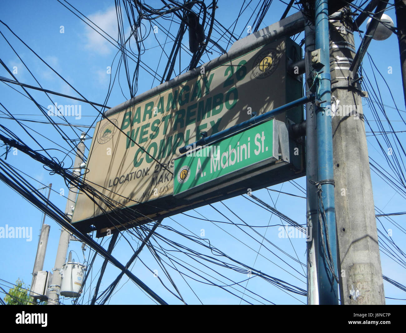 This image shows a road in the urban area of Makati, specifically J.P ...