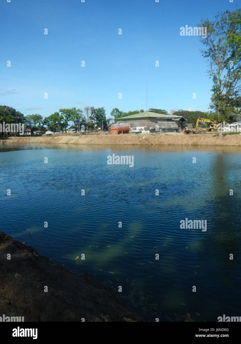 This image shows the fish ponds in the Malamig area of Bustos, Bulacan ...