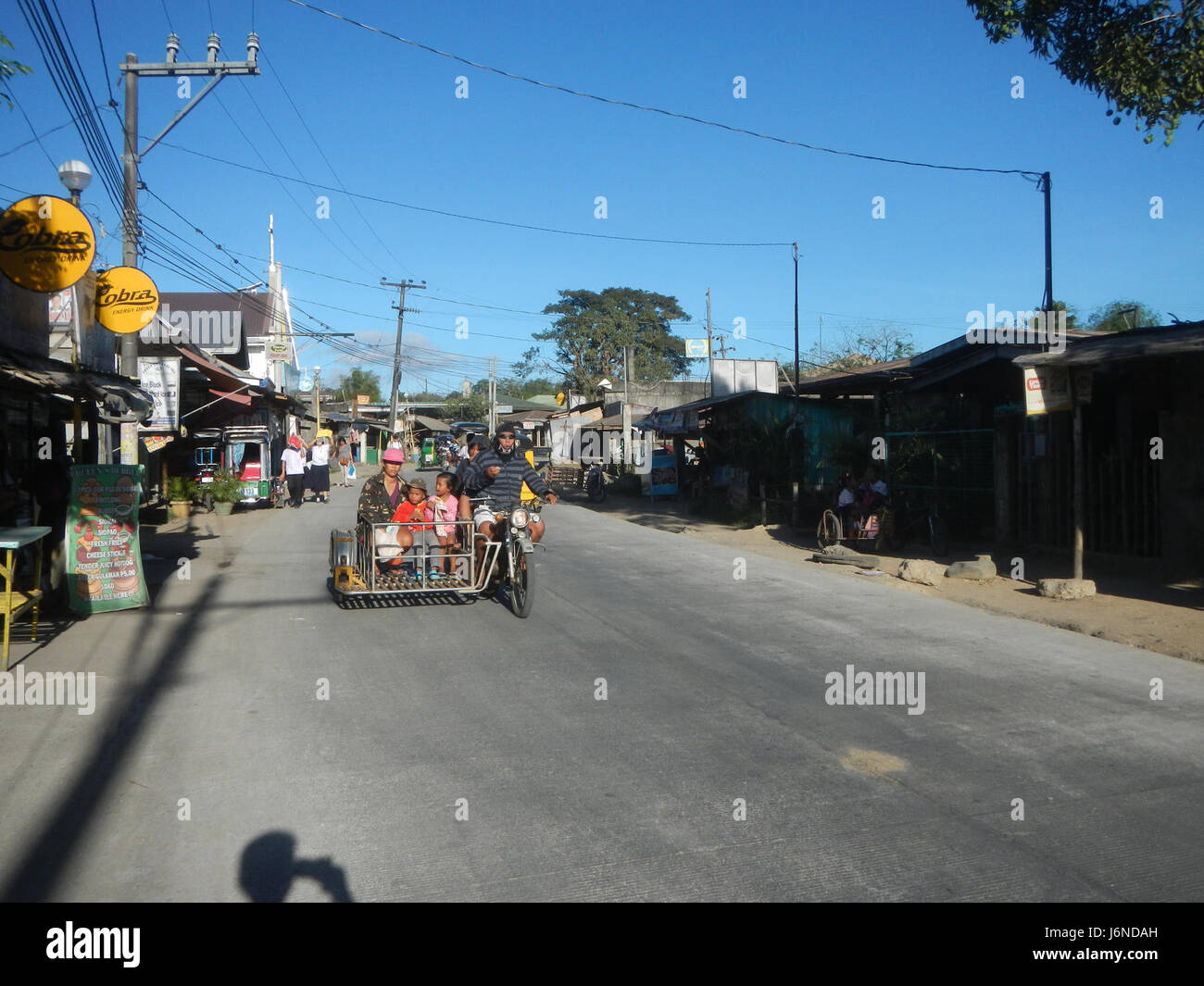The image shows a view of Alexis G. Santos National High School in ...