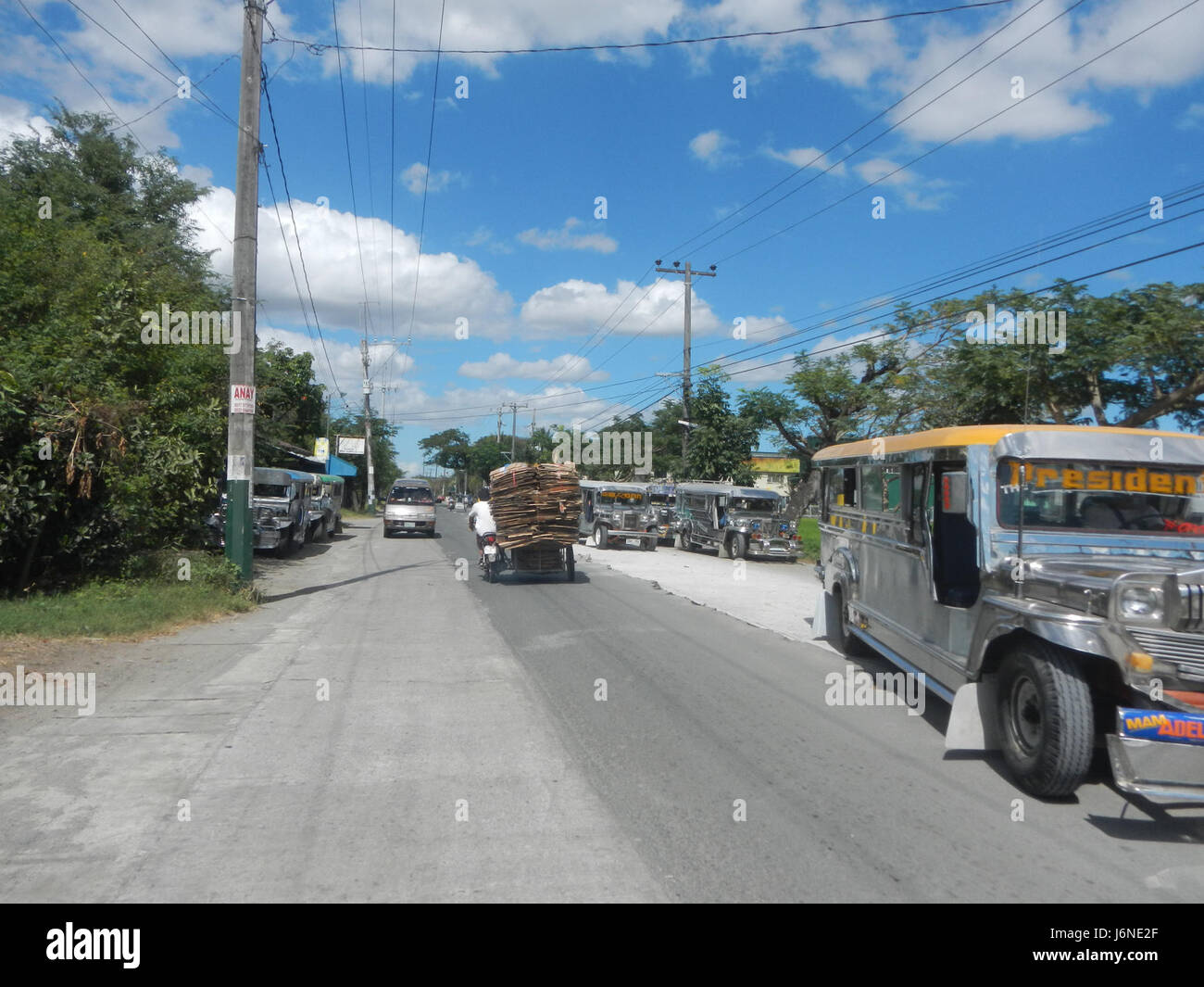 This image shows a scene along the Provincial Road 23 in Bulacan ...
