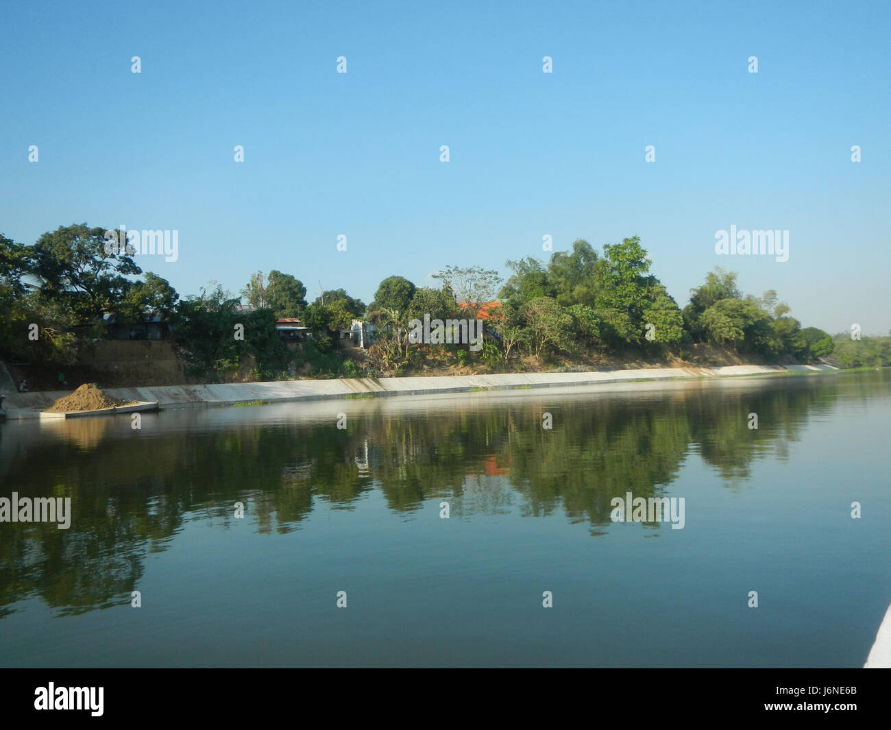 This image captures the riverbanks of Pulilan, a town in Bulacan ...