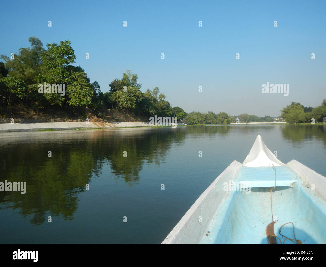 This image shows the riverbanks along the Pulilan River in Bulacan ...