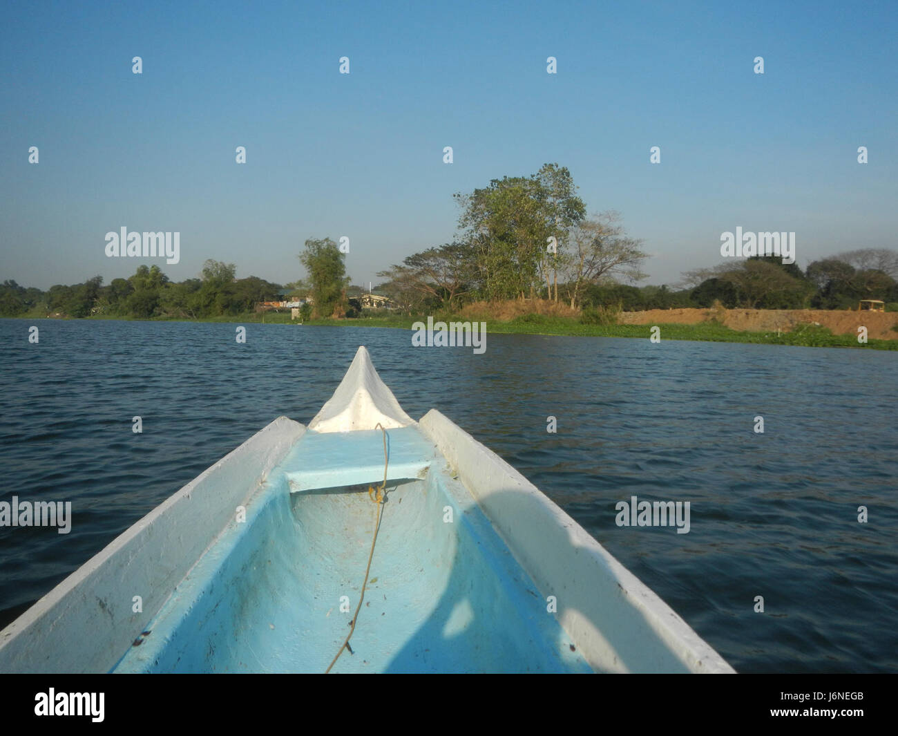 This image shows the riverbanks along the Pulilan River in Bulacan ...