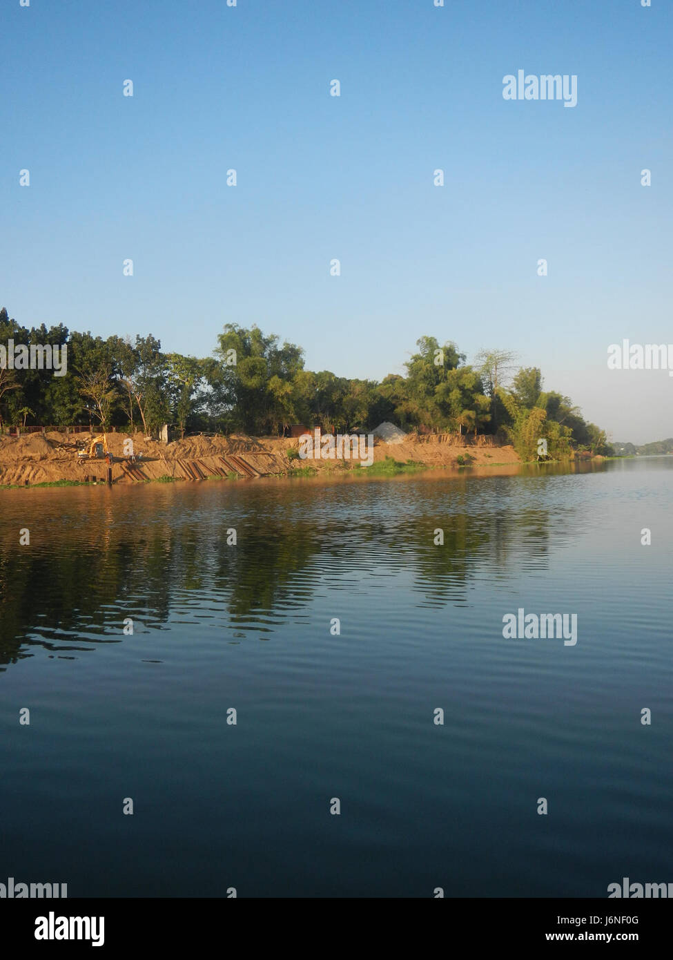Photograph capturing the riverbanks of Pulilan, featuring the ...