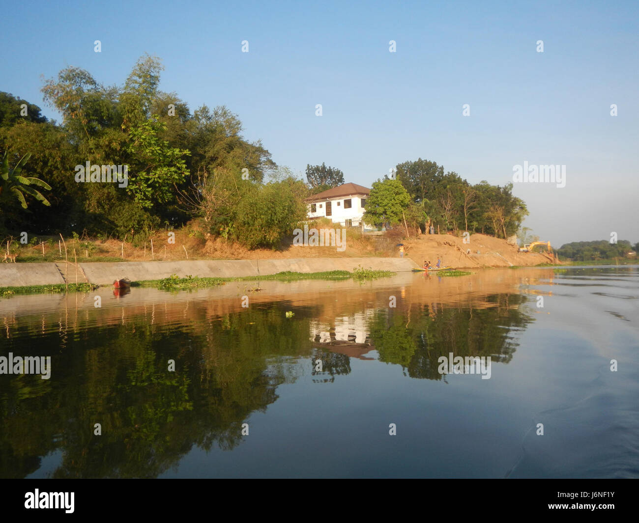 A view of the riverbanks along the Pulilan River in Bulacan ...