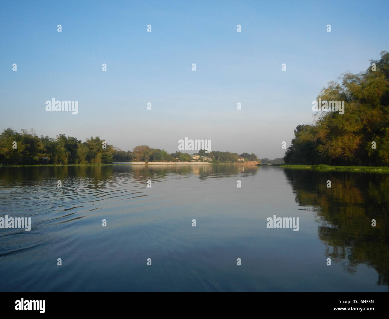 This image shows the riverbanks of Pulilan in Bulacan, Philippines ...