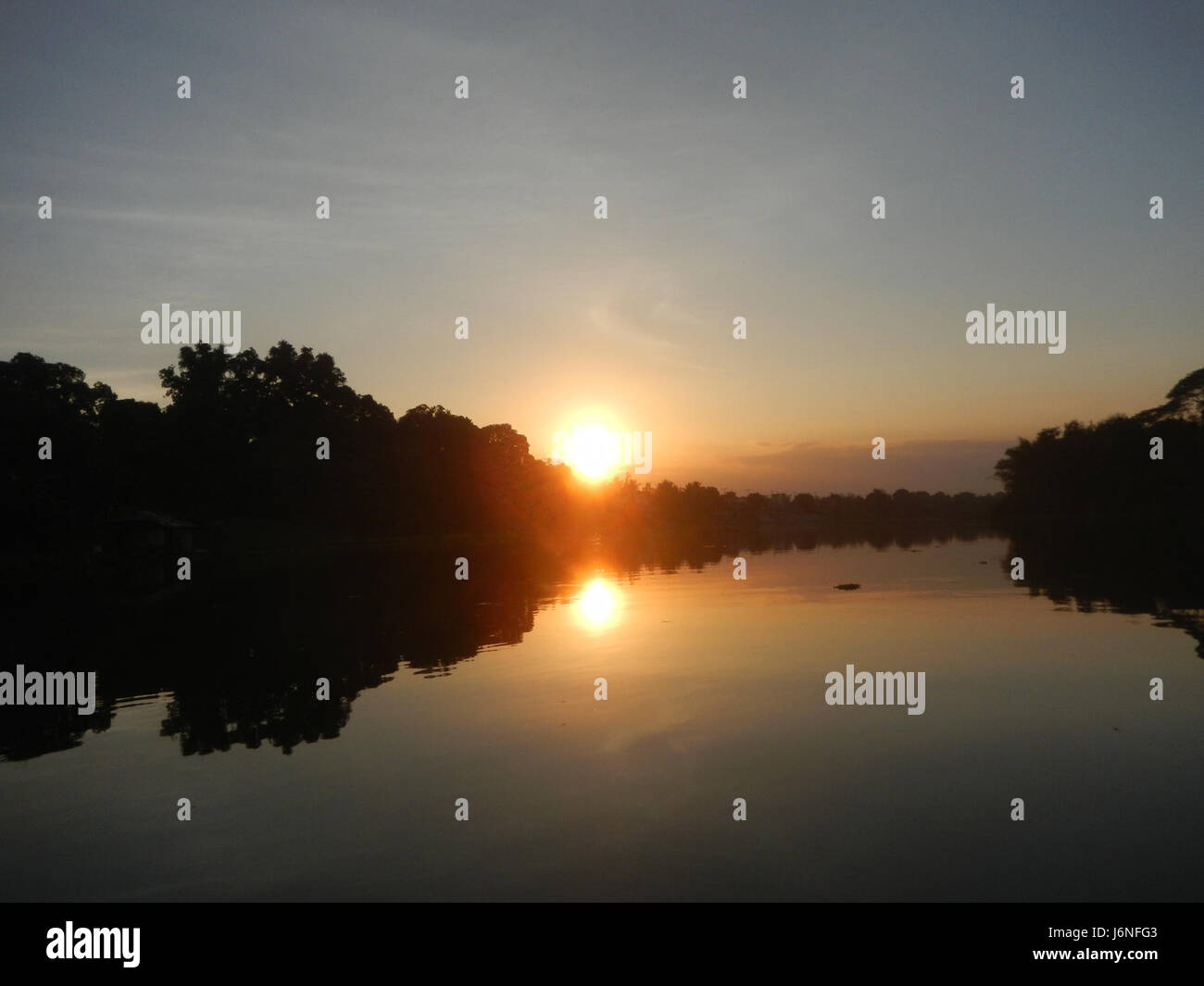 09282 is a photograph capturing the scenic riverbanks of the Pulilan ...