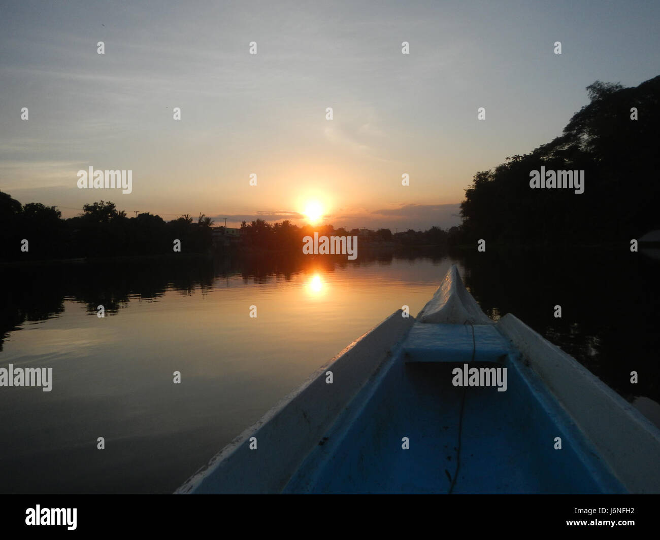 This photograph showcases the riverbanks of Pulilan in Bulacan ...