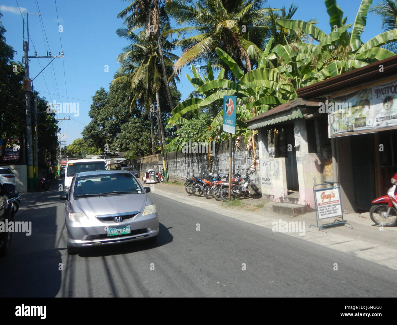 The Poblacion San Roque road construction in Pandi, Bulacan, focuses on ...
