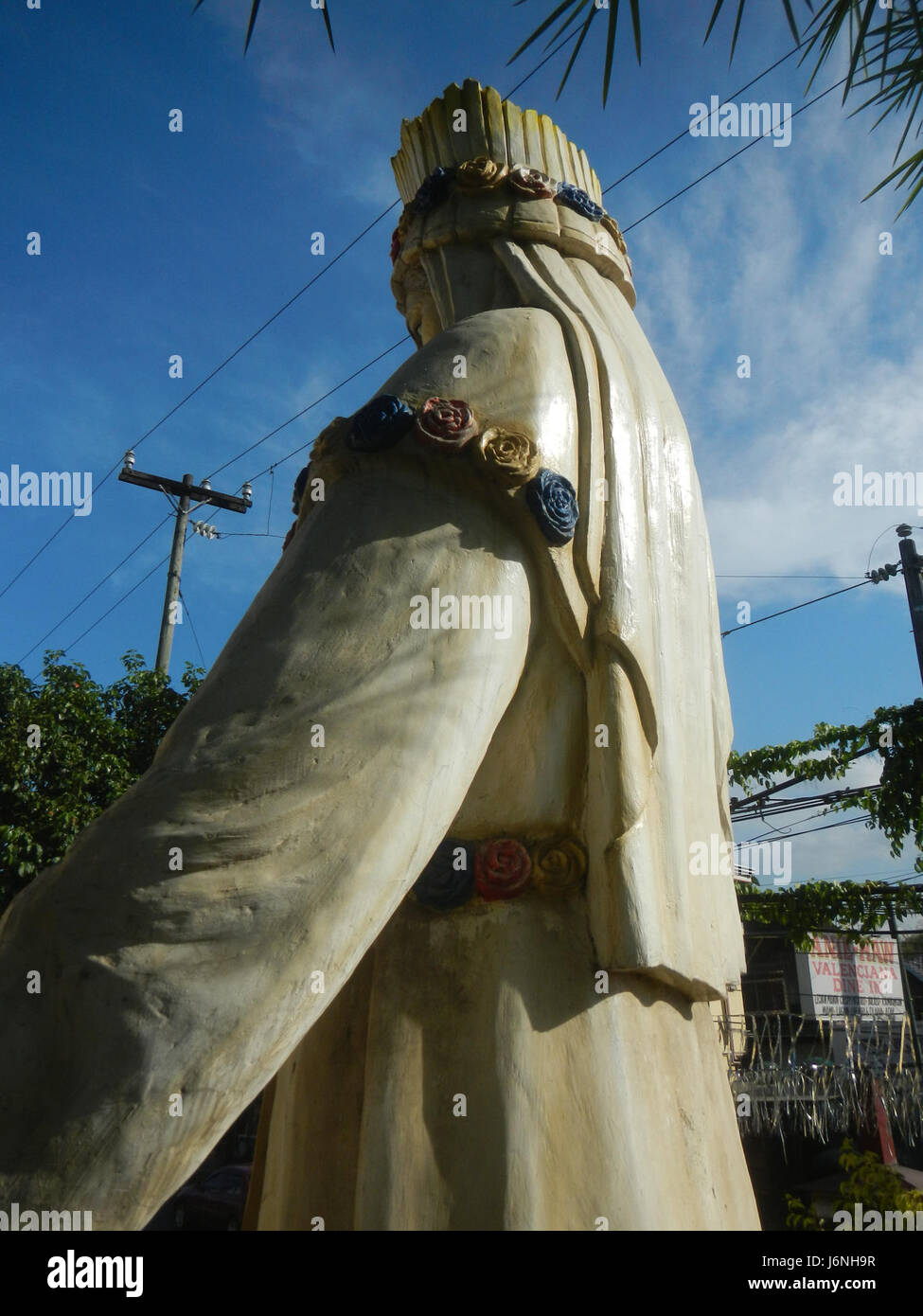 This image features the San Isidro Labrador Church and the Muzon Grotto ...
