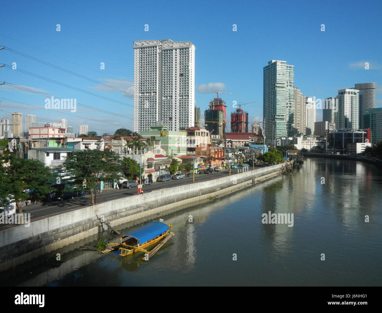 This image captures the area around the Hulo Bridge, connecting Makati ...