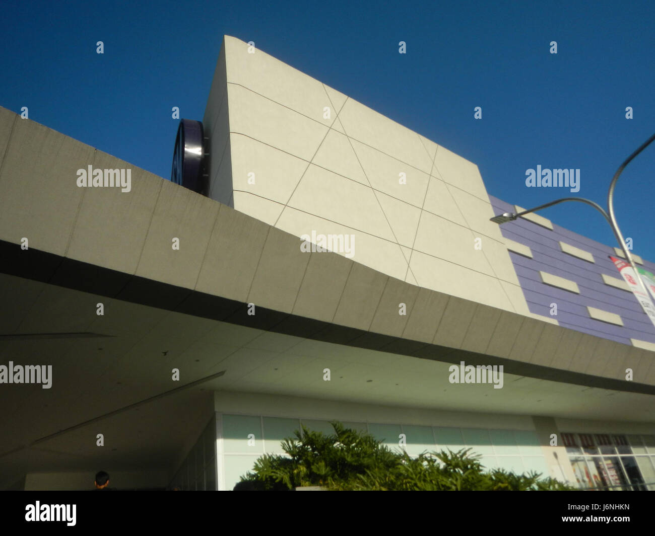 This image shows the exterior of the SM City San Jose del Monte Mall in ...