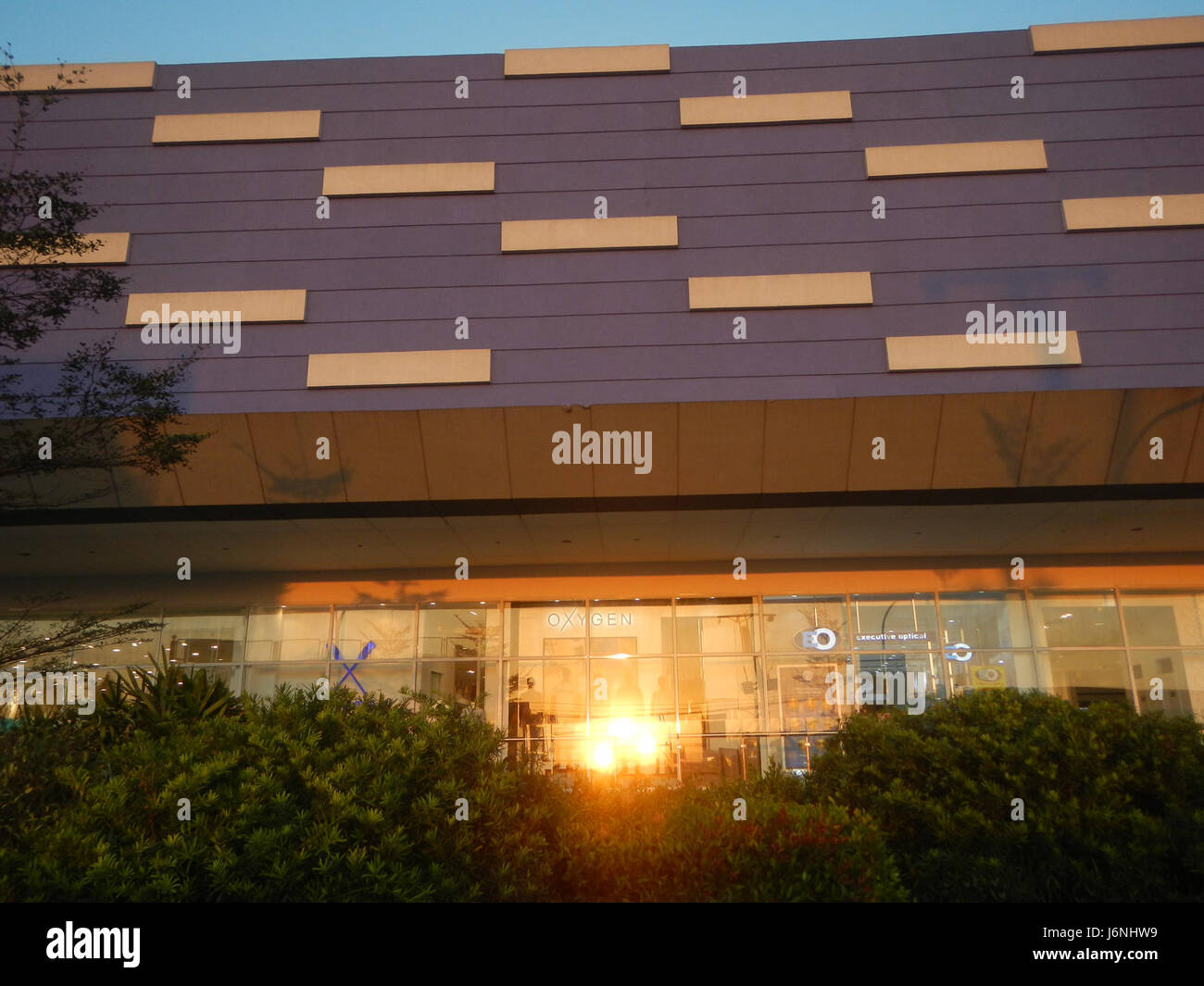 This image shows the exterior view of SM City San Jose Del Monte ...