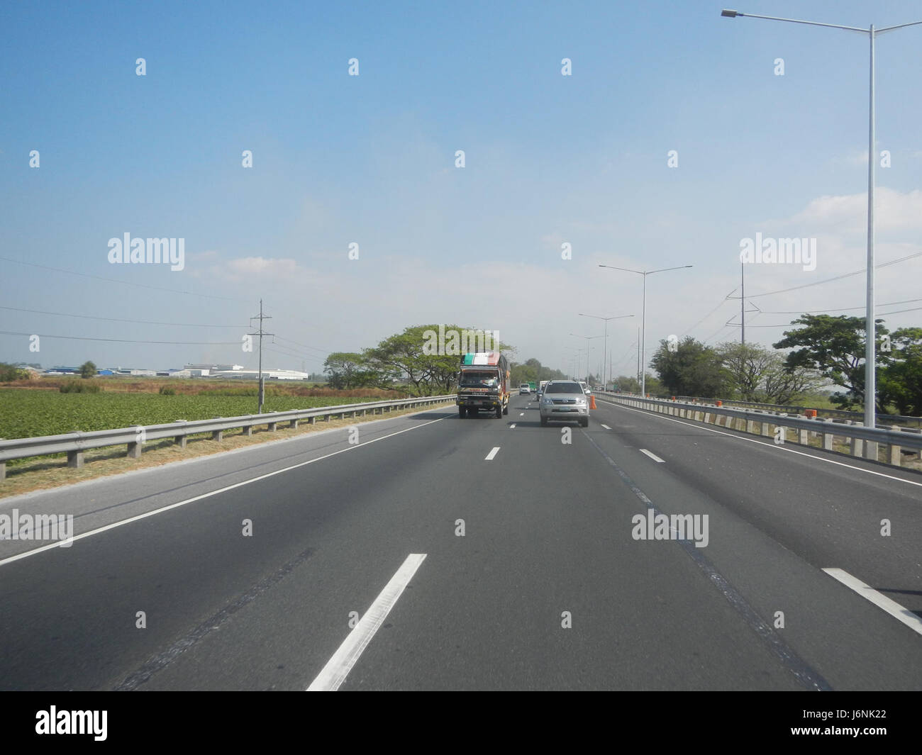 This image depicts the San Simon exit along the North Luzon Expressway ...