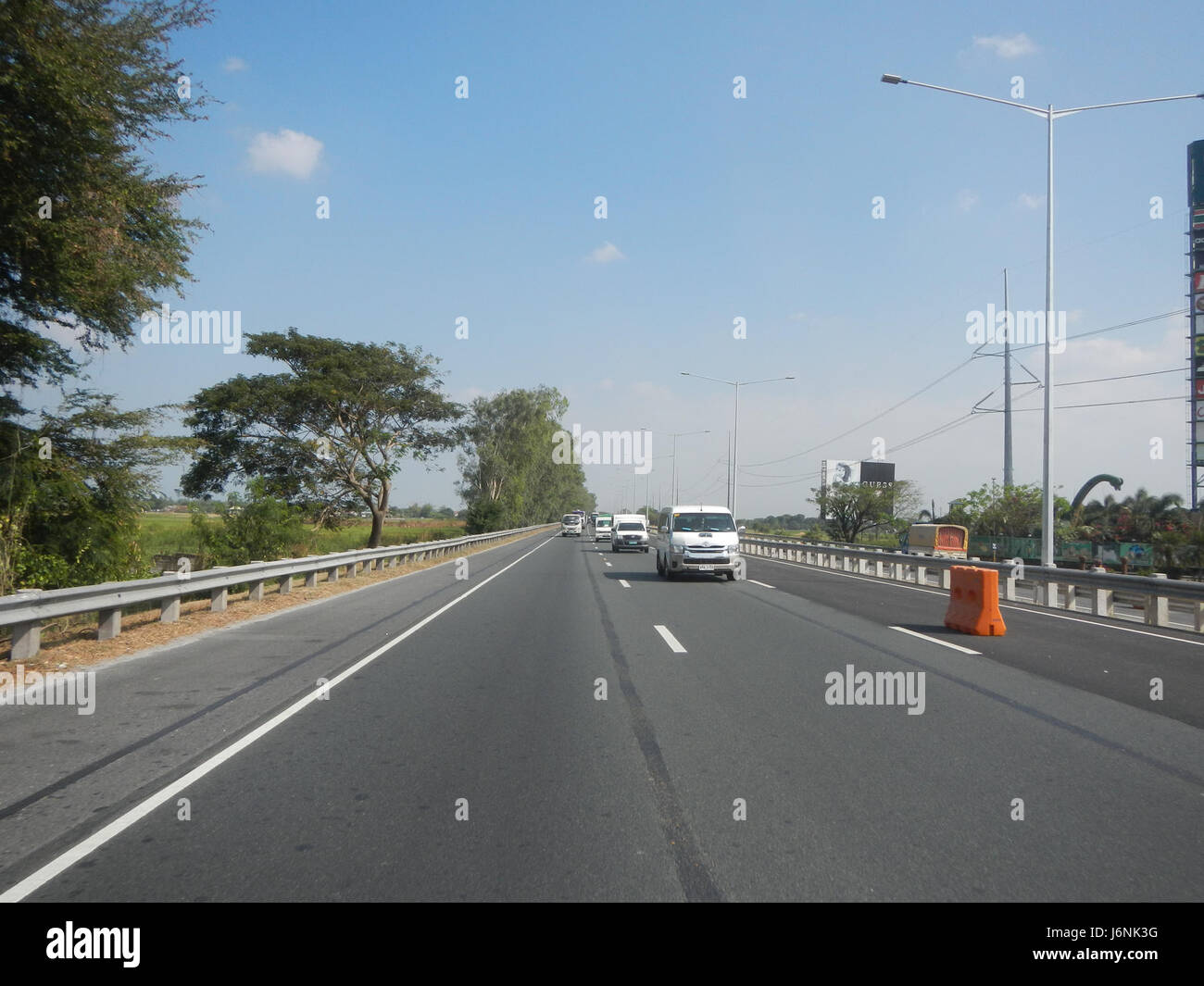 This image depicts the San Simon Exit along the North Luzon Expressway ...