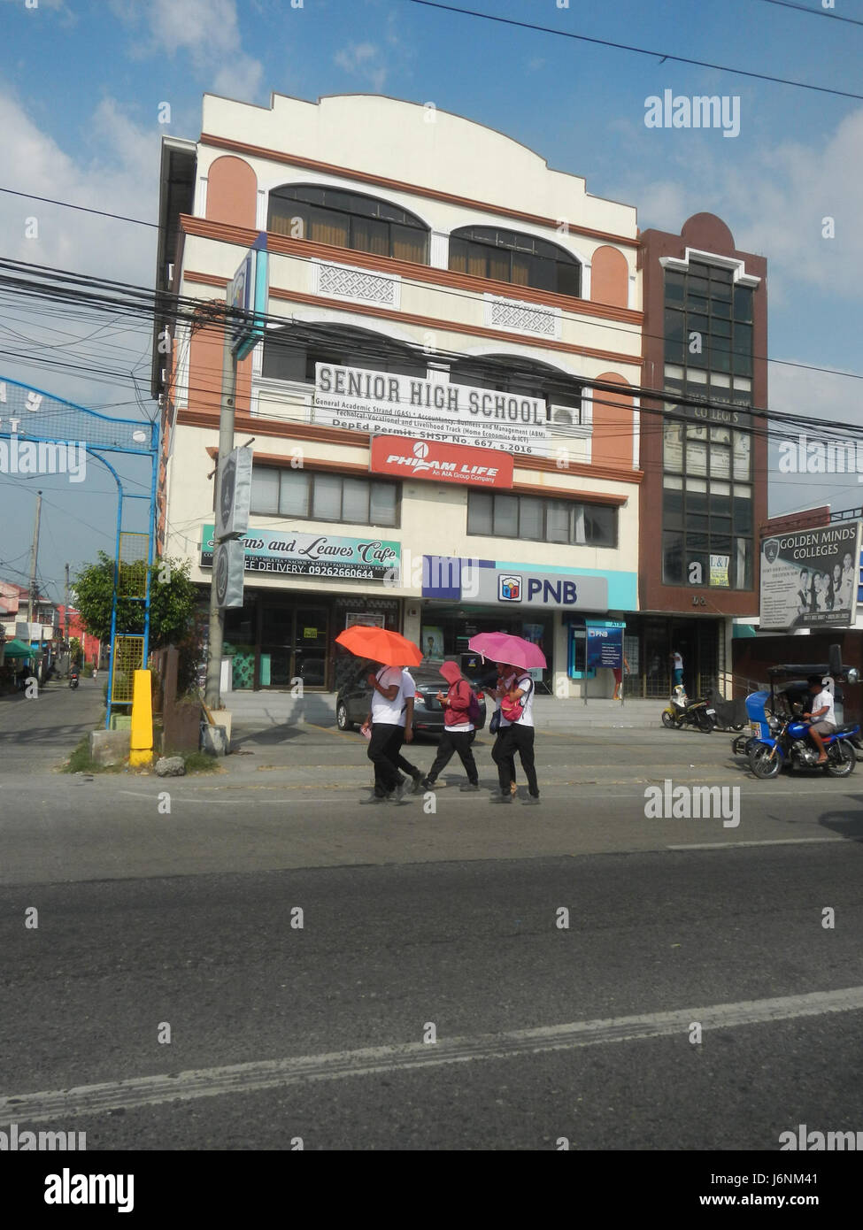 This image shows MacArthur Highway in Bulacan, Philippines, capturing a ...