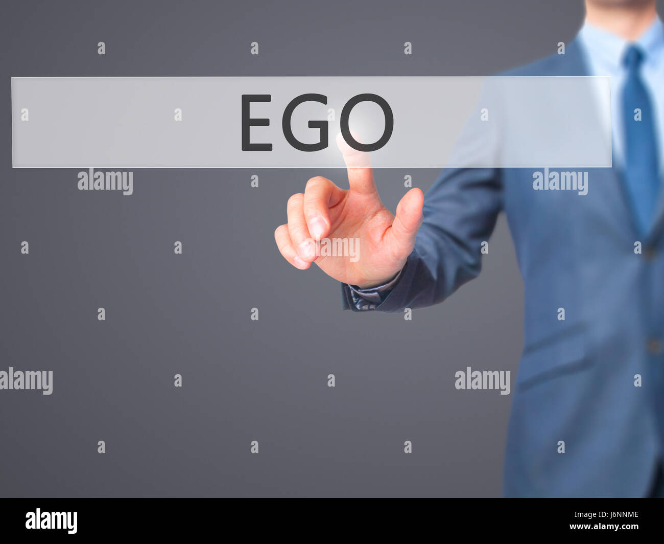 Ego - Businessman hand pressing button on touch screen interface ...