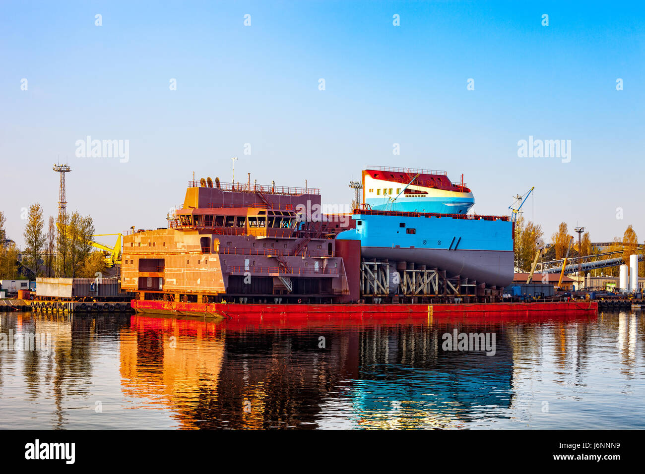 Hull of ship under construction at shipyard Stock Photo - Alamy