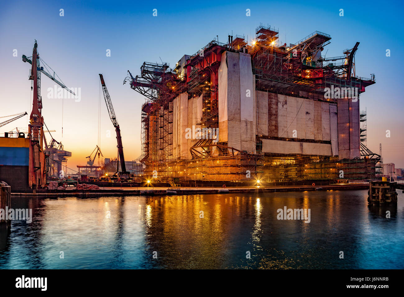 Oil rig under construction at night in Gdansk, Poland Stock Photo - Alamy