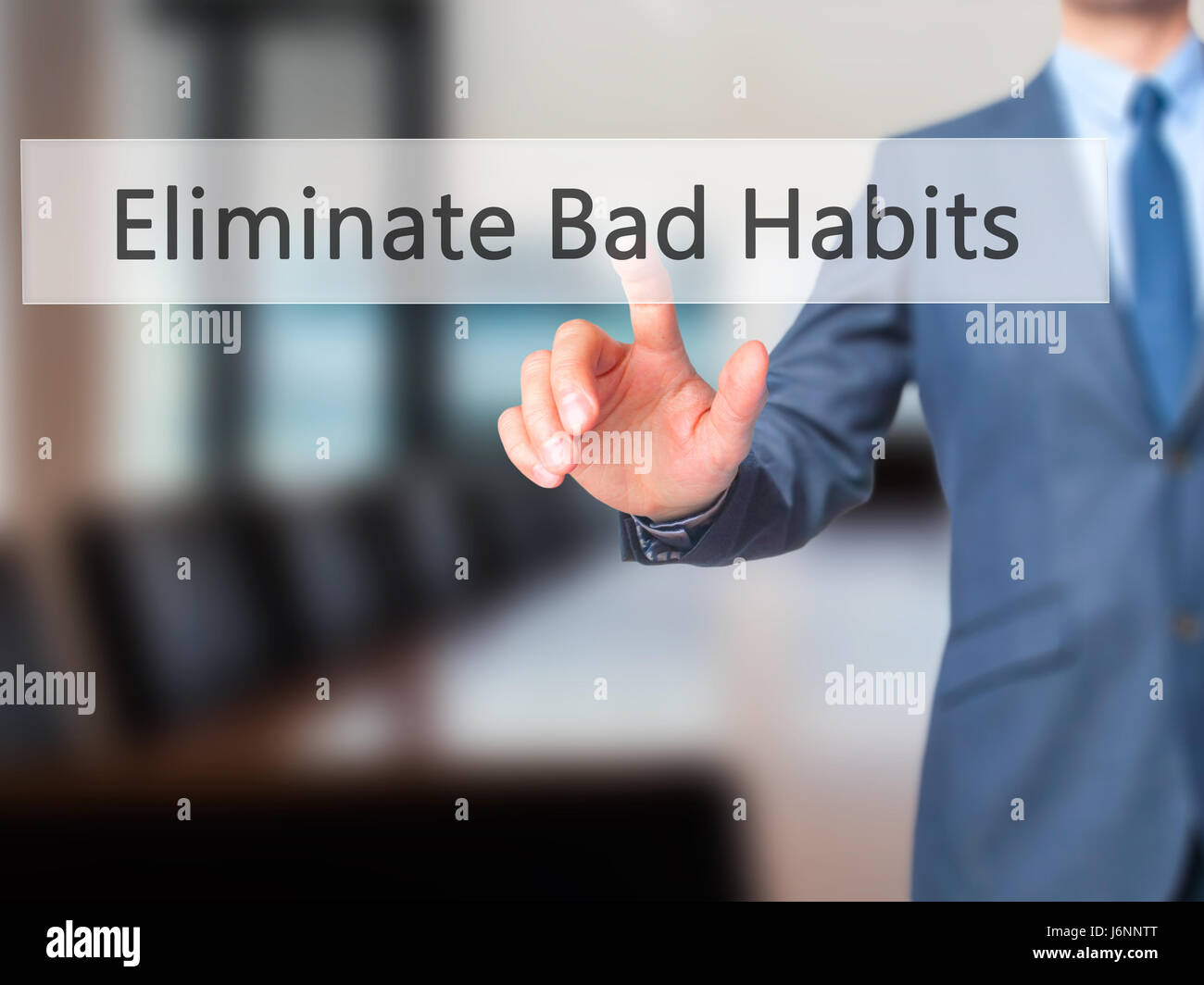 Eliminate Bad Habits - Businessman hand touch button on virtual screen ...
