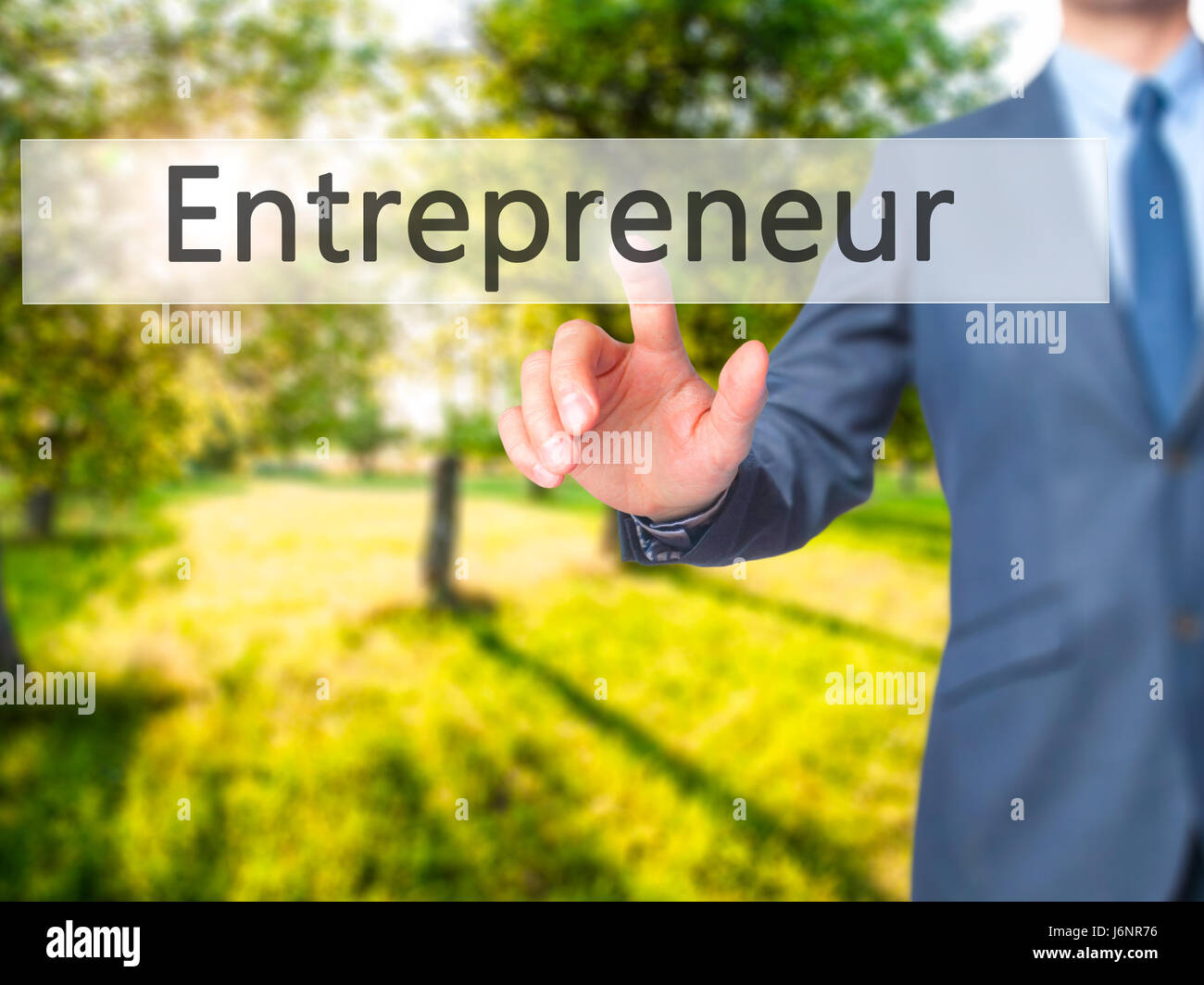 Entrepreneur - Businessman hand pressing button on touch screen ...