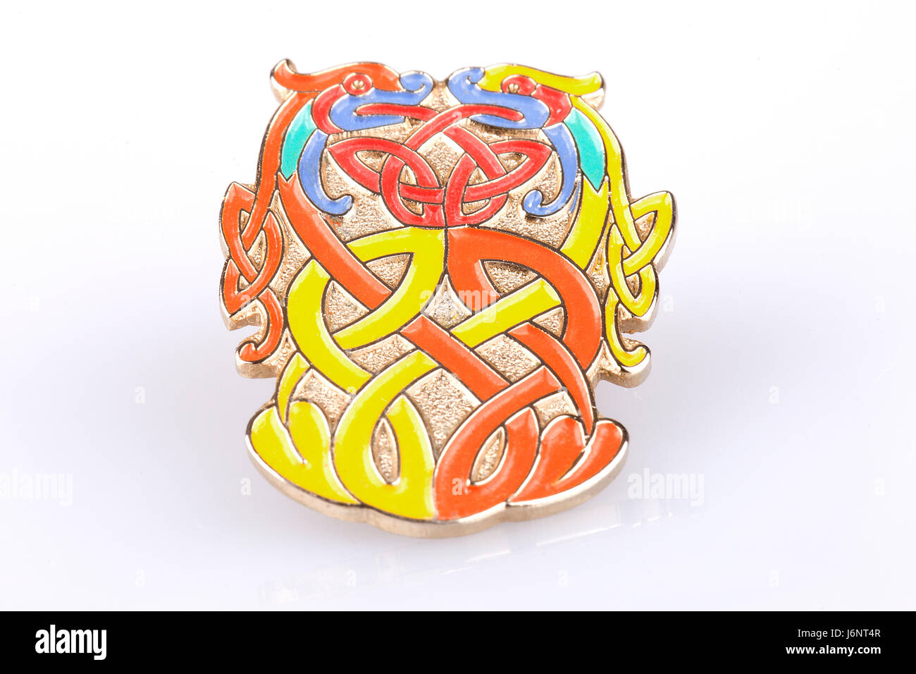 Irish pin on a white surface. Irish brooch isolated on white background ...