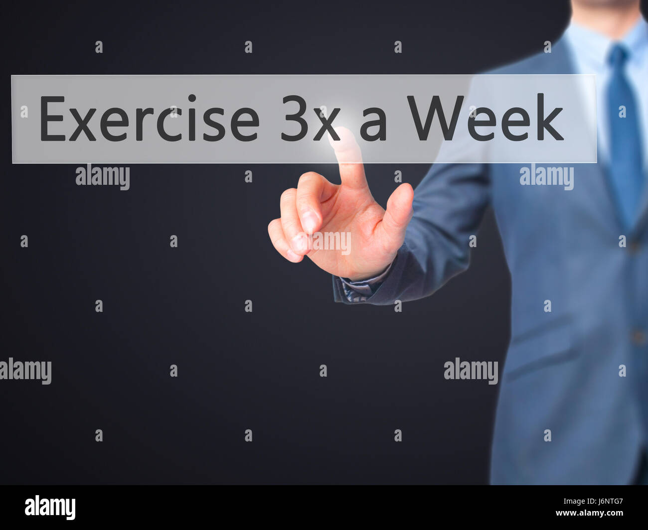 Exercise 3x a Week - Businessman hand pressing button on touch screen ...