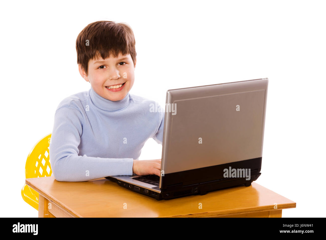 seven years Boy Surfing the net isolated on white Stock Photo - Alamy