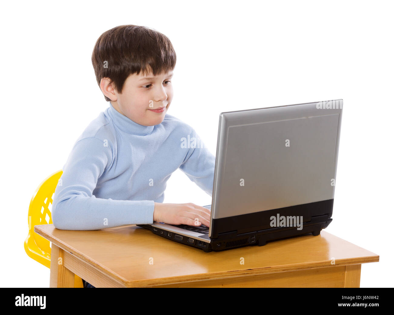 seven years Boy Surfing the net isolated on white Stock Photo - Alamy