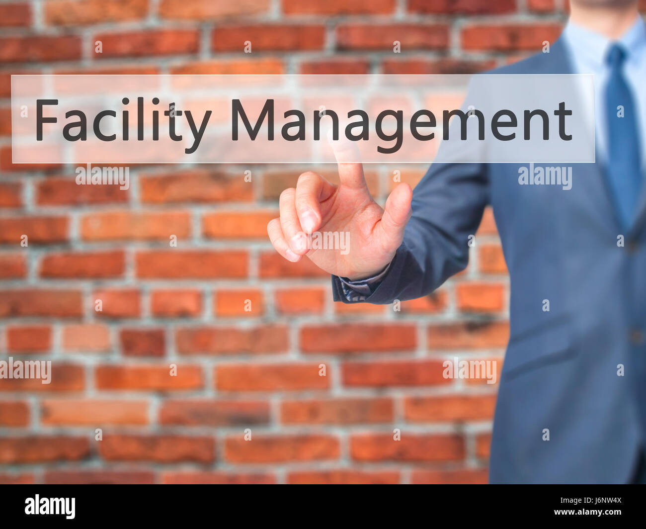 Facility Management - Businessman hand pressing button on touch screen ...