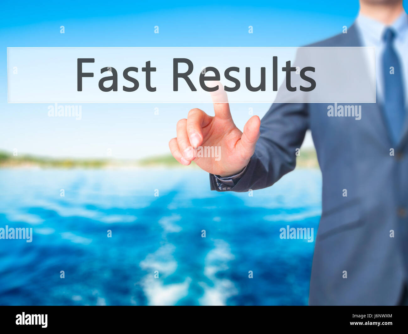 Fast Results - Businessman hand pressing button on touch screen ...