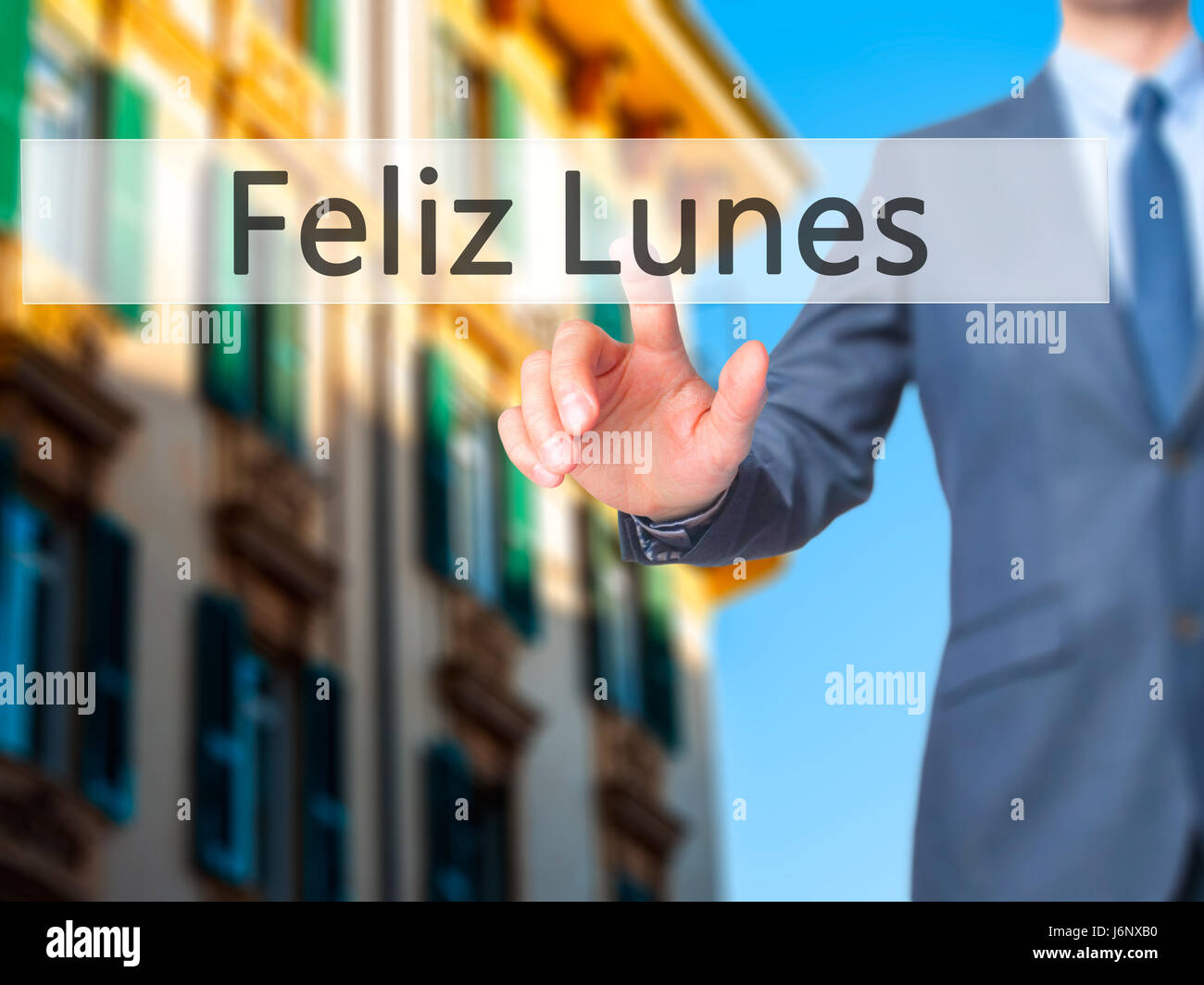 Feliz Lunes (Happy Monday In Spanish) - Businessman hand pressing ...