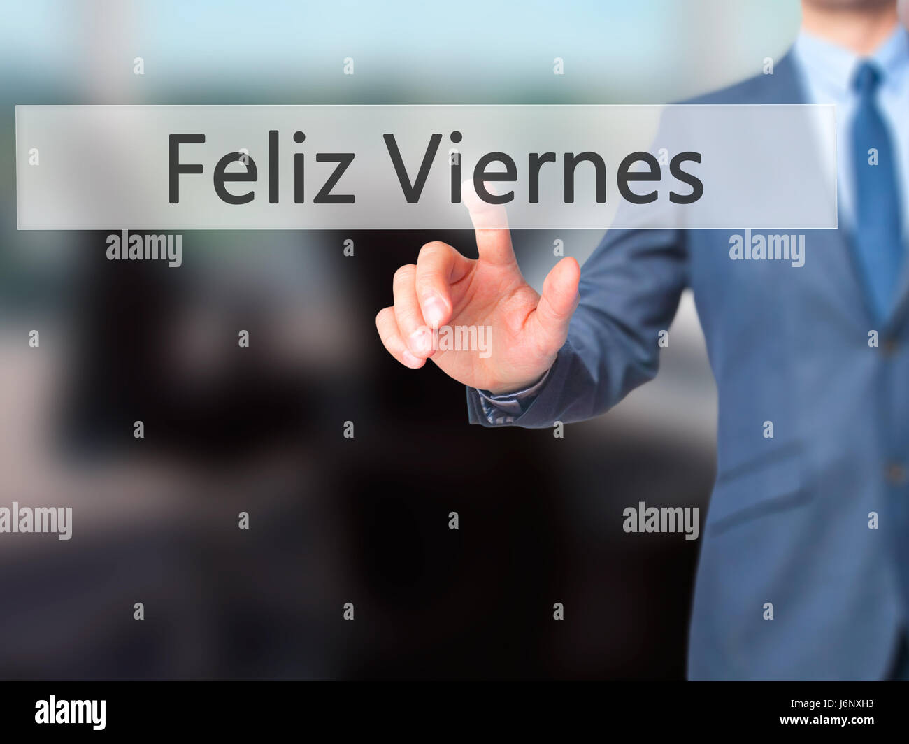 Feliz Viernes (Happy Friday In Spanish) - Businessman hand pressing ...
