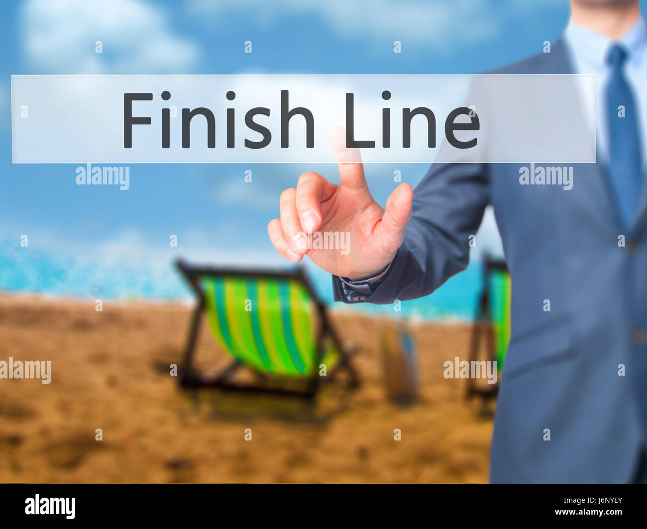 Finish Line - Businessman hand pressing button on touch screen ...