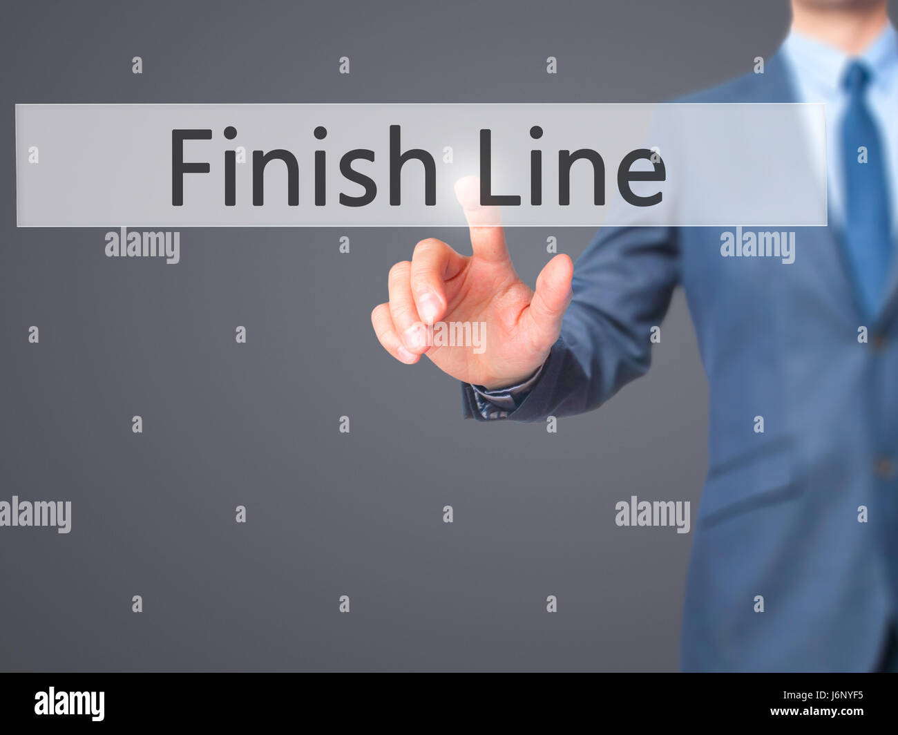 Finish Line - Businessman hand pressing button on touch screen ...