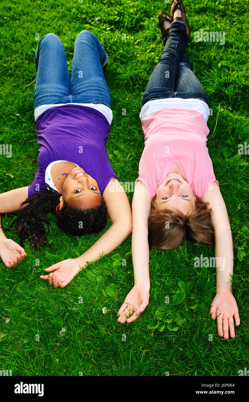 playful meadow grass lawn green girl girls teens teenagers youth ...