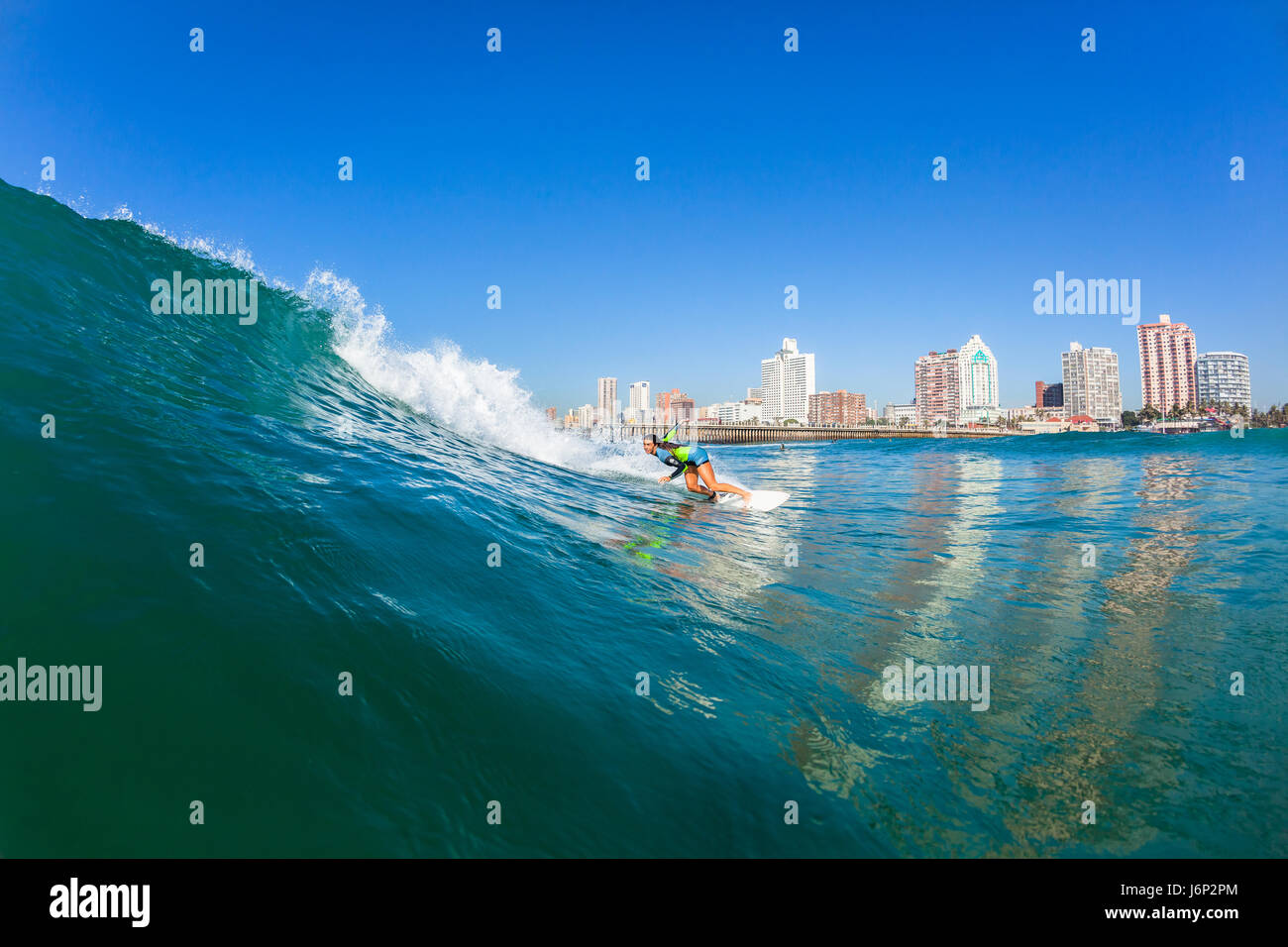Girl riding wave hi-res stock photography and images - Alamy