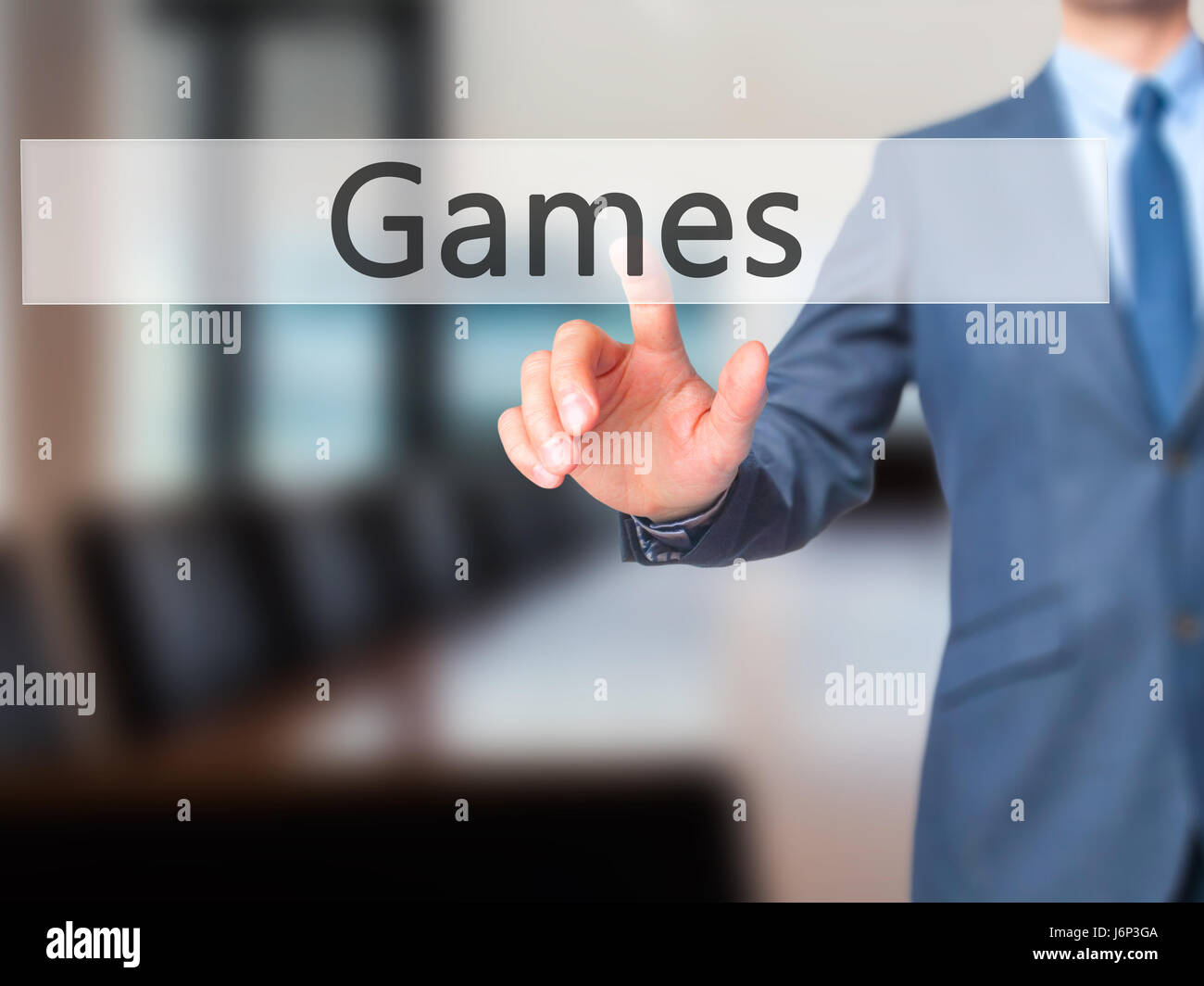 Games - Businessman hand pressing button on touch screen interface ...