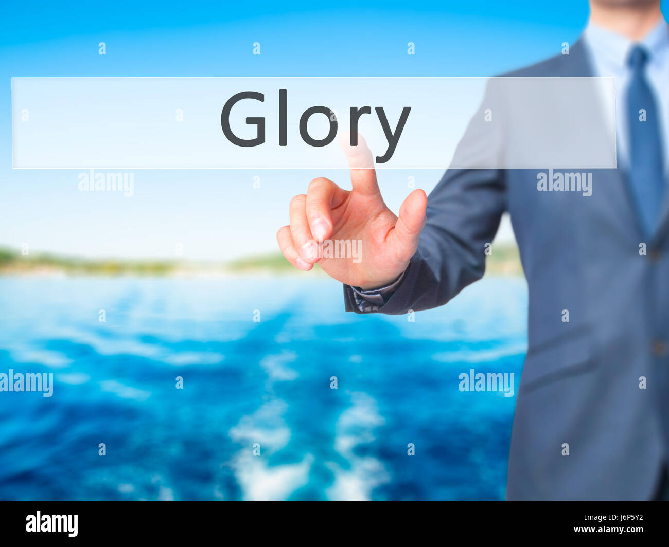 Glory - Businessman hand pressing button on touch screen interface ...