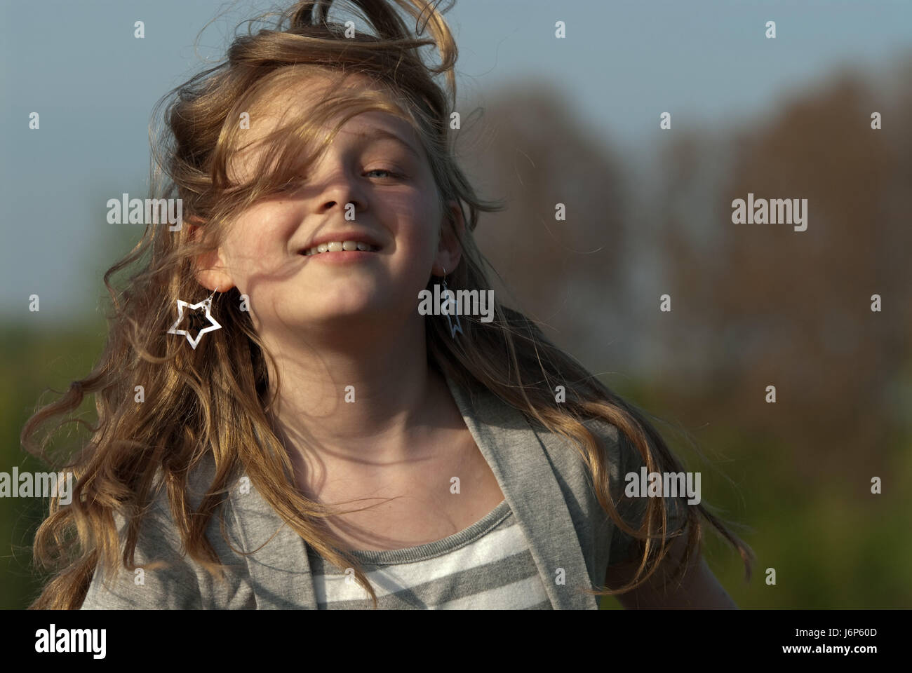 Children windy hi-res stock photography and images - Alamy