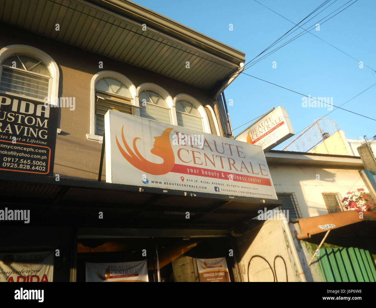Photograph of J.P. Rizal Street in the Olympia Poblacion area ...