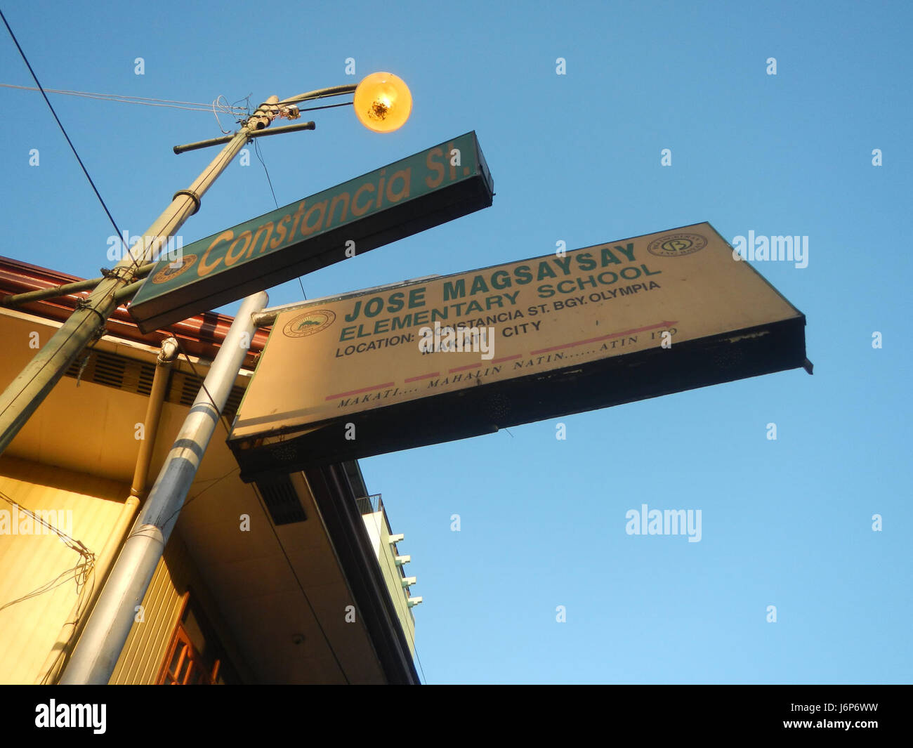 This image showcases J.P. Rizal Street in Olympia, Poblacion ...